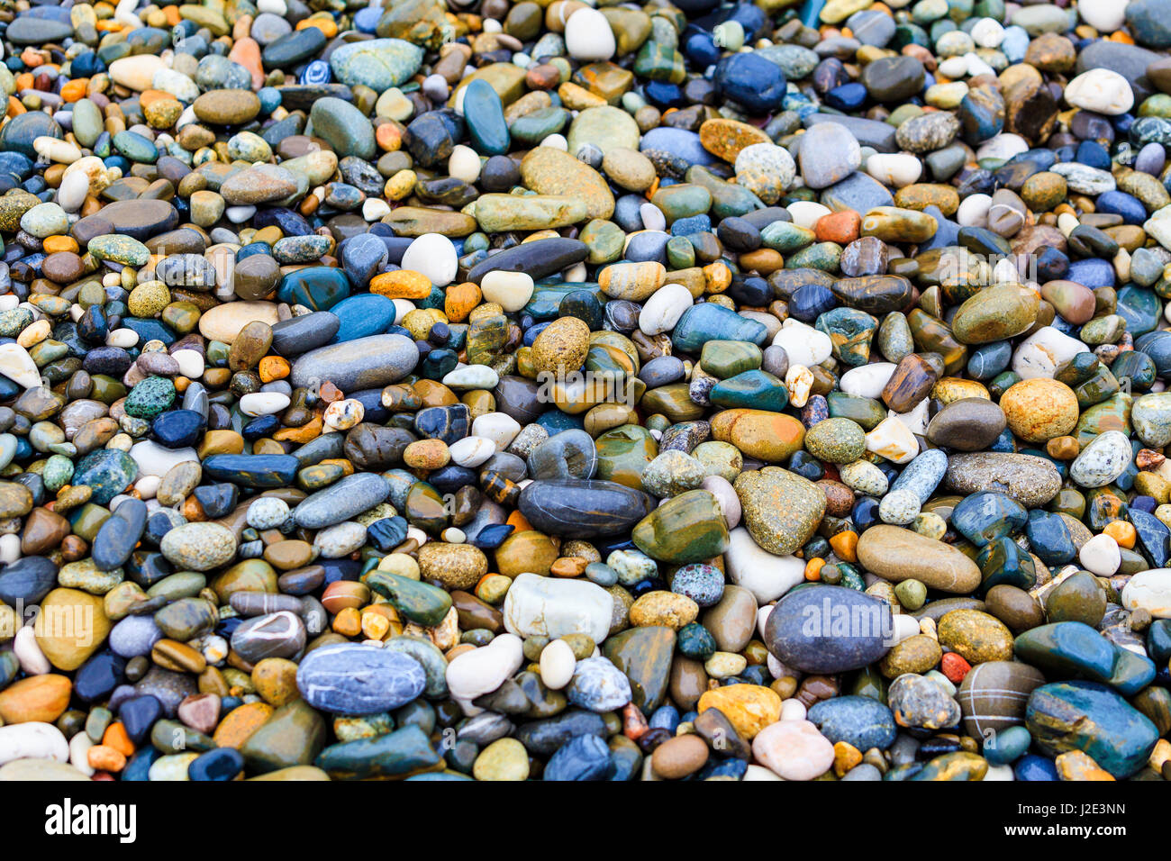 stones on the beach. stone background Stock Photo - Alamy