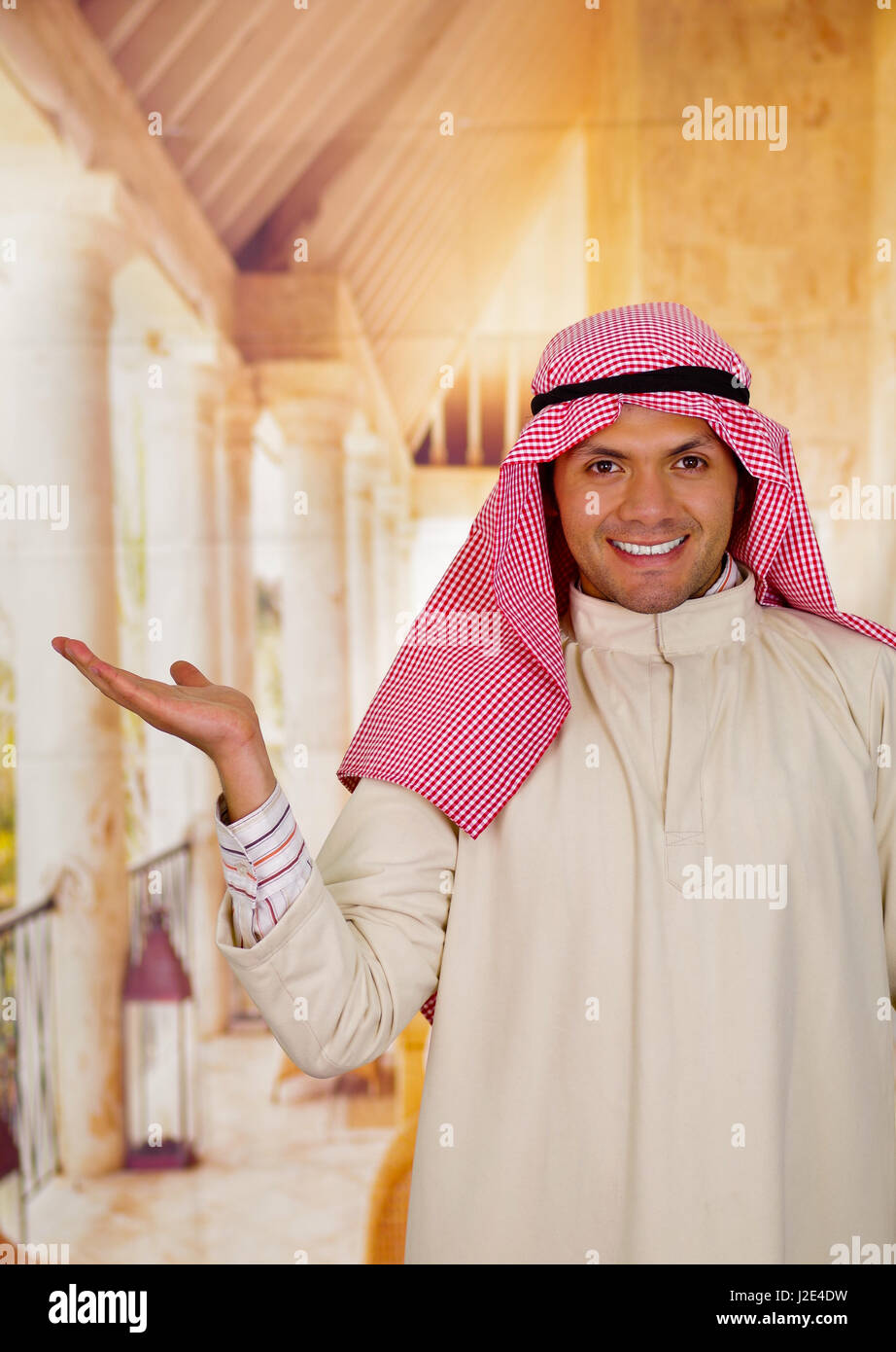 smiling cute young arabian man posing happy Stock Photo - Alamy
