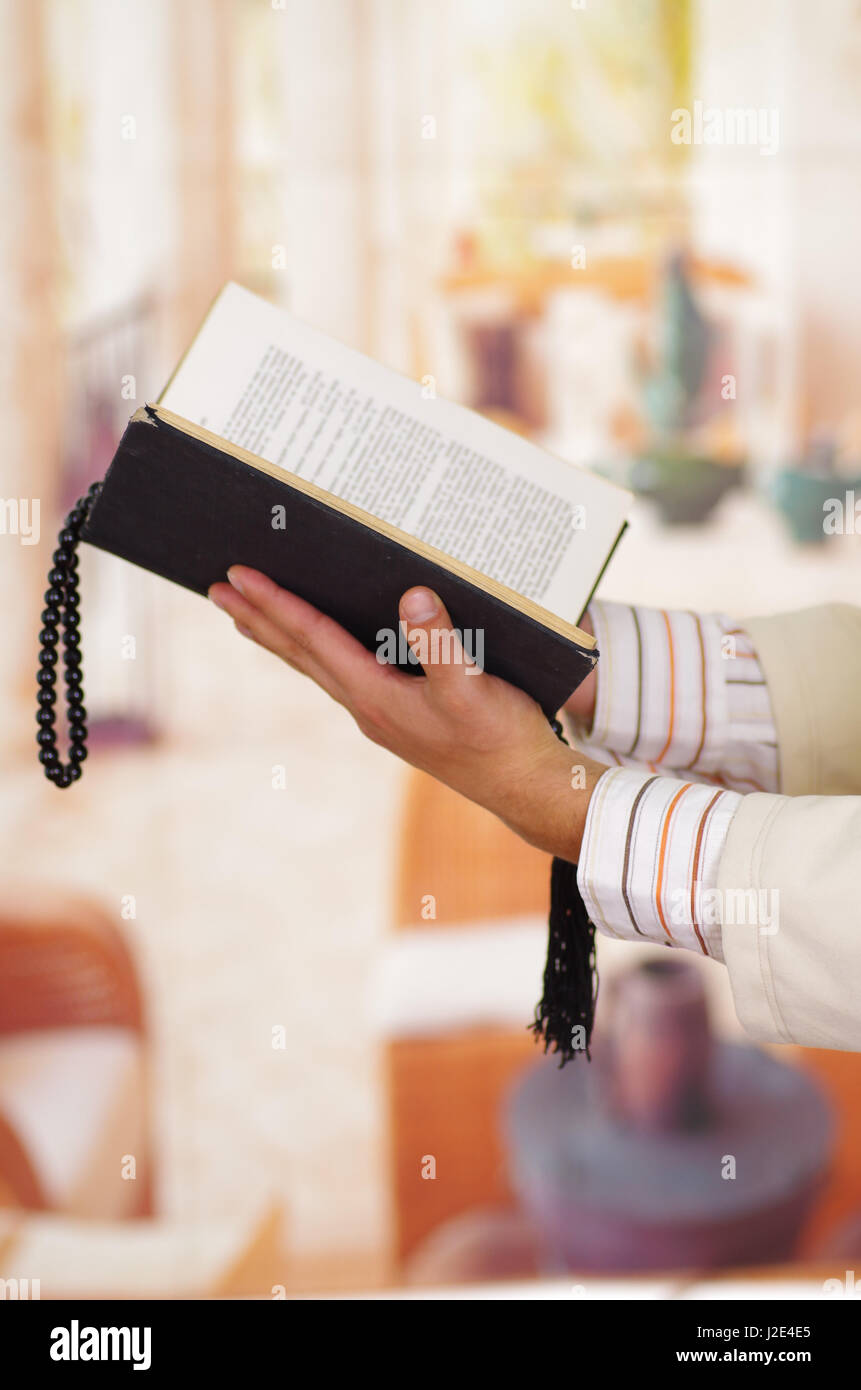 Adult Muslim Man Is Reading The Koran Stock Photo - Alamy