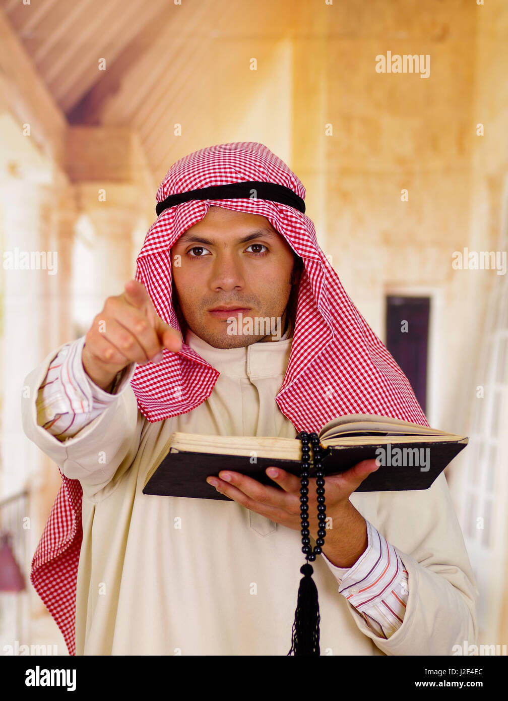 Adult Muslim Man Is Reading The Koran Stock Photo - Alamy