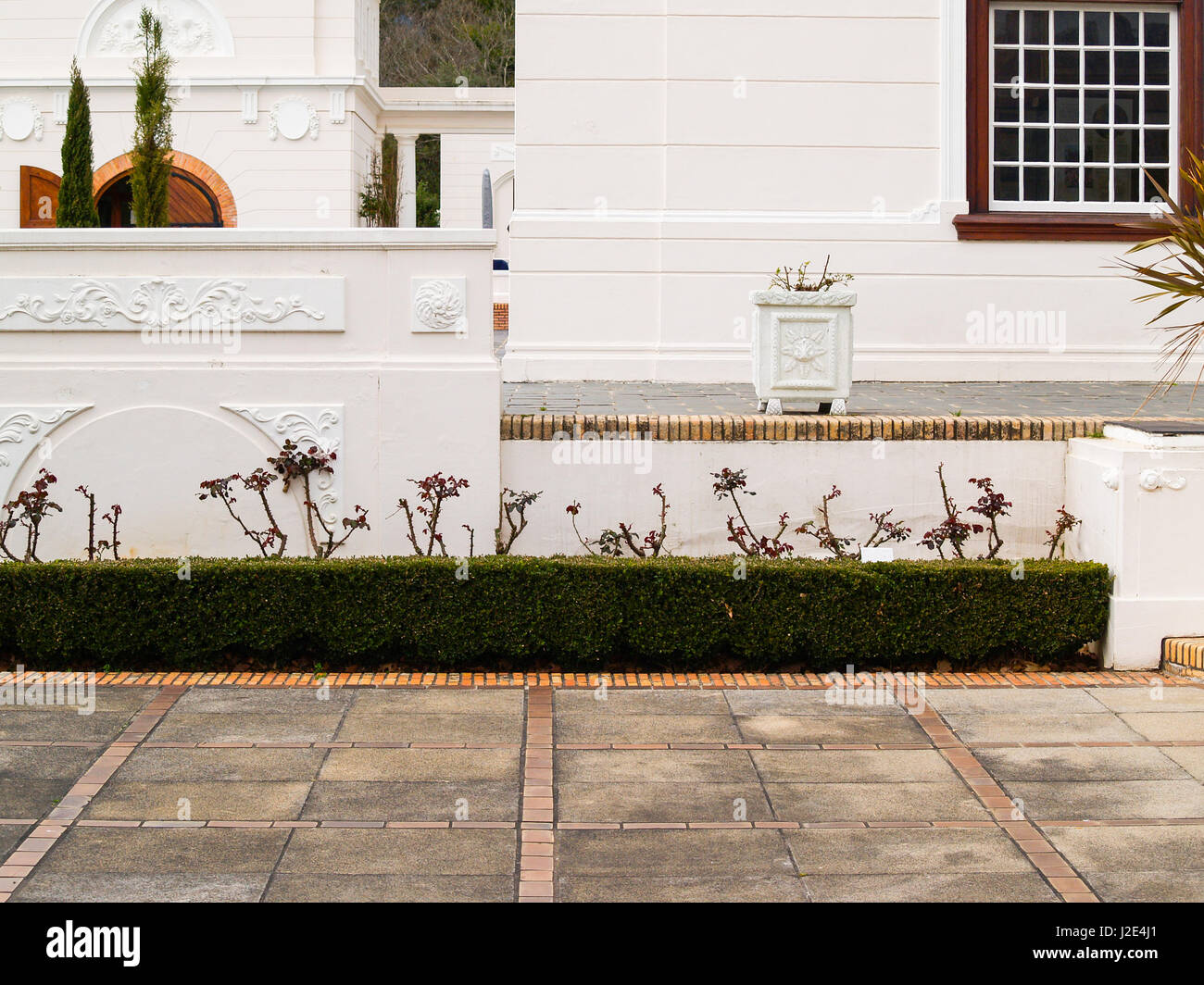 Architectural detail Dutch Cape style white plaster walls and ornate ...
