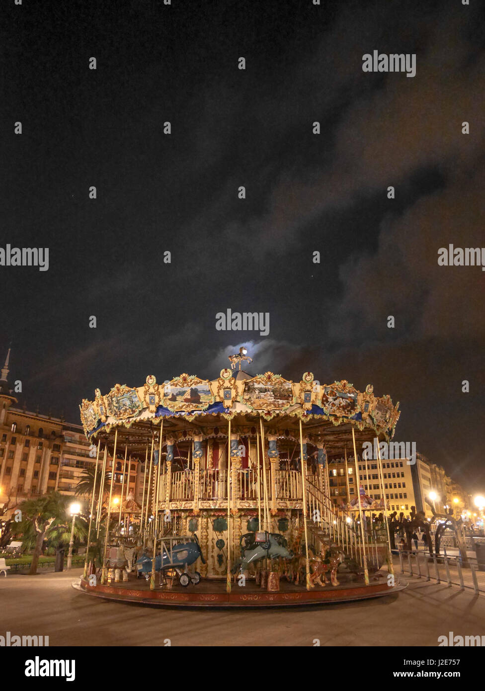 Merry go round carousel closed during night Stock Photo - Alamy