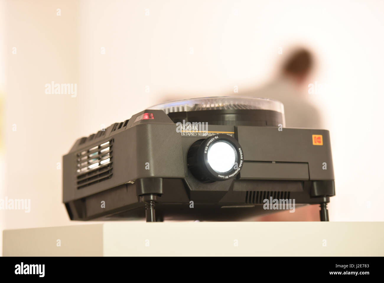 Old school projector with film showing movie Stock Photo - Alamy