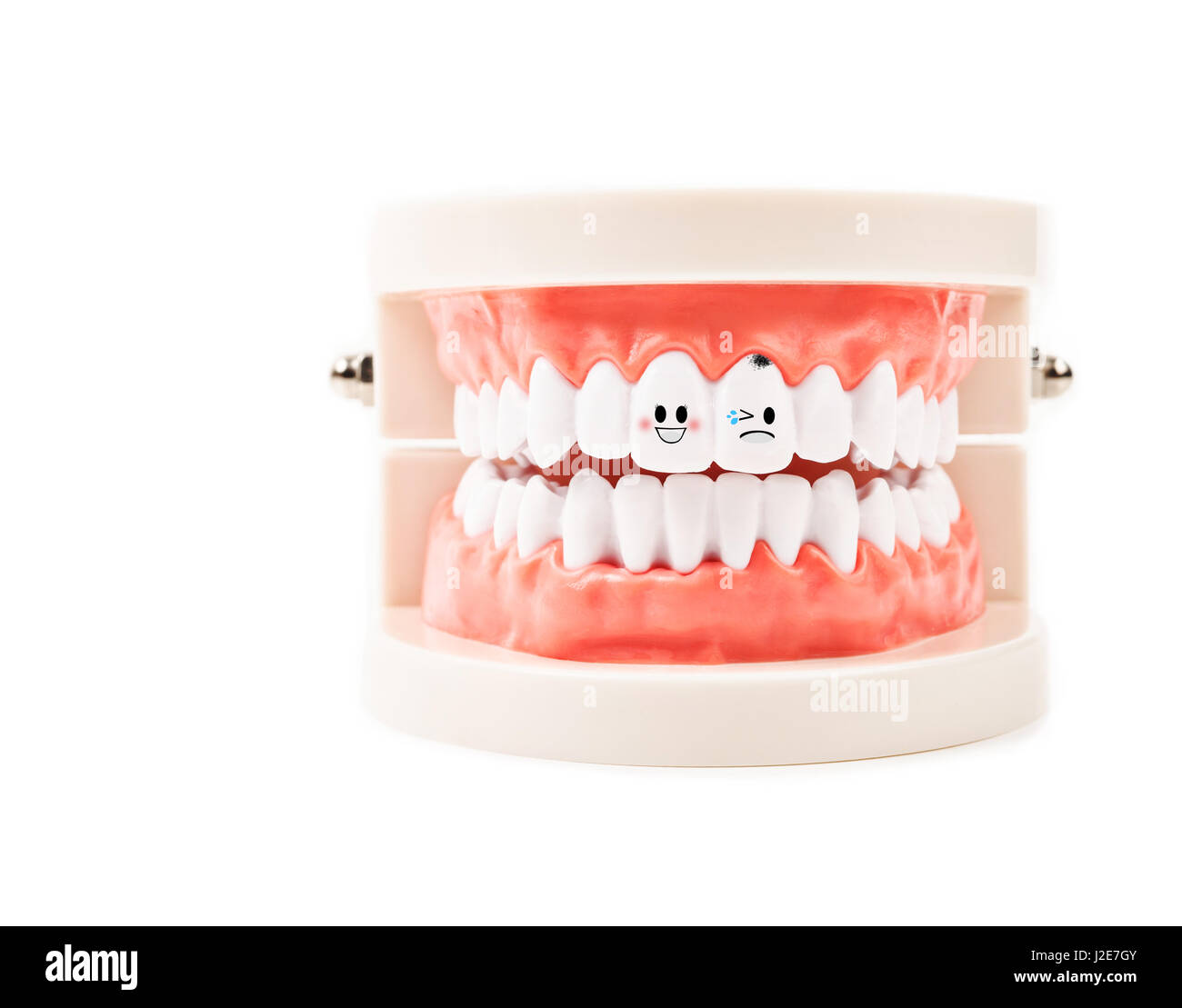 Dental Model with smile and crying face on tooth get sick on white ...