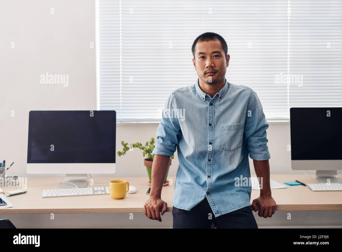 Portrait focused asian businessman hi-res stock photography and images ...