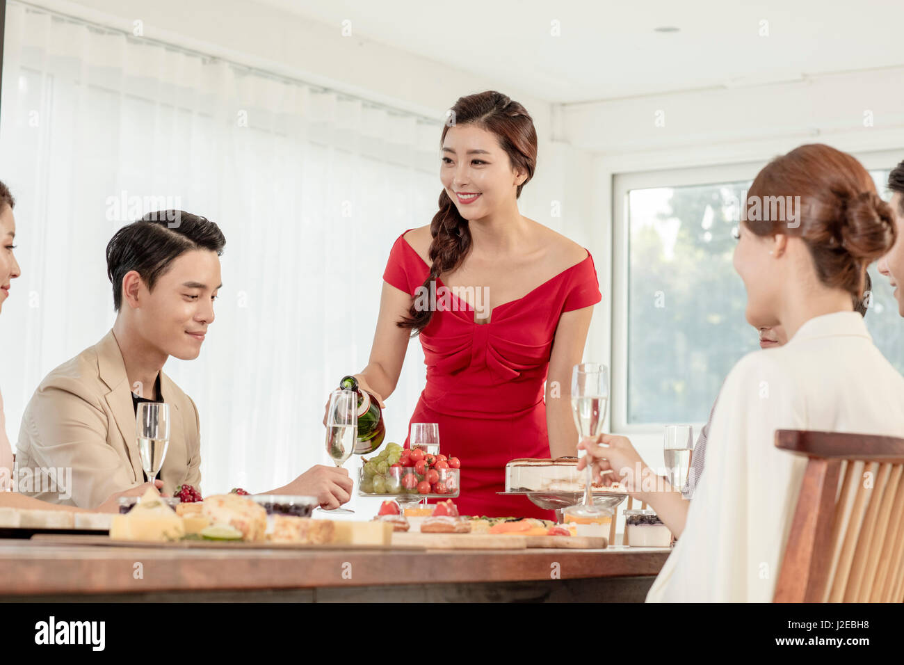 Young smiling people at party Stock Photo - Alamy
