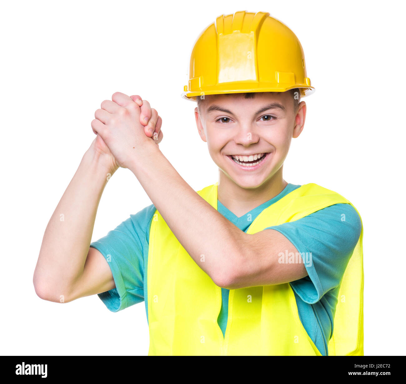 Boy wearing yellow hard hat Stock Photo - Alamy