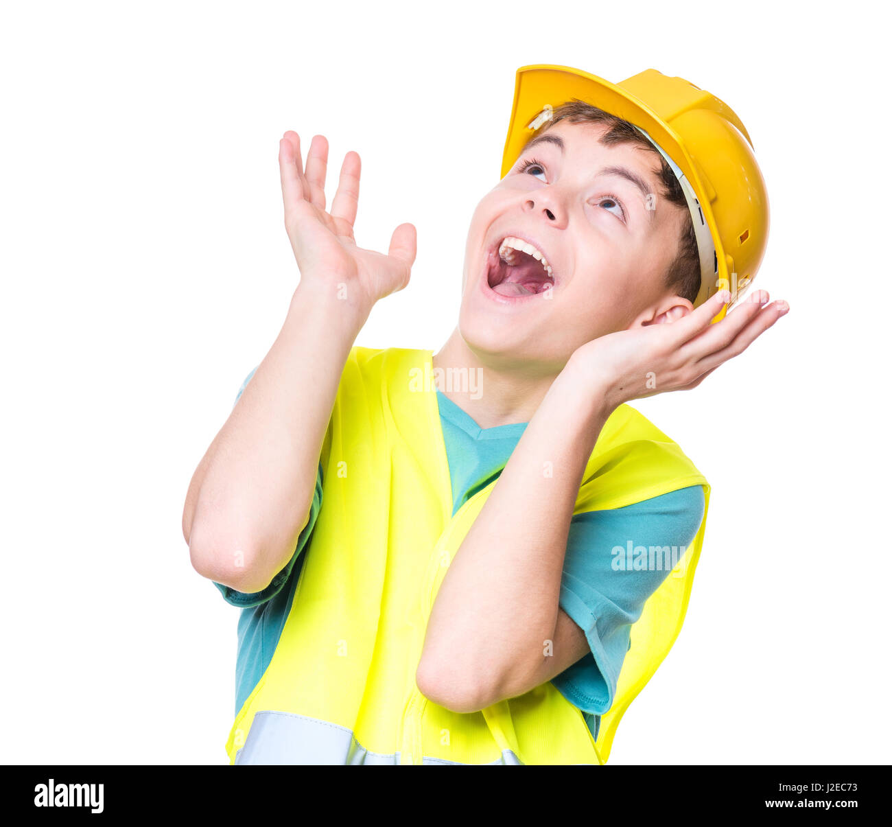 Boy wearing yellow hard hat Stock Photo - Alamy