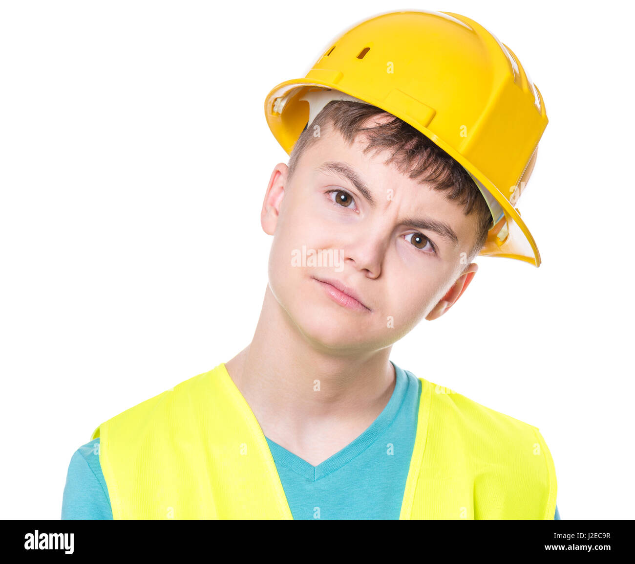 Boy wearing yellow hard hat Stock Photo - Alamy