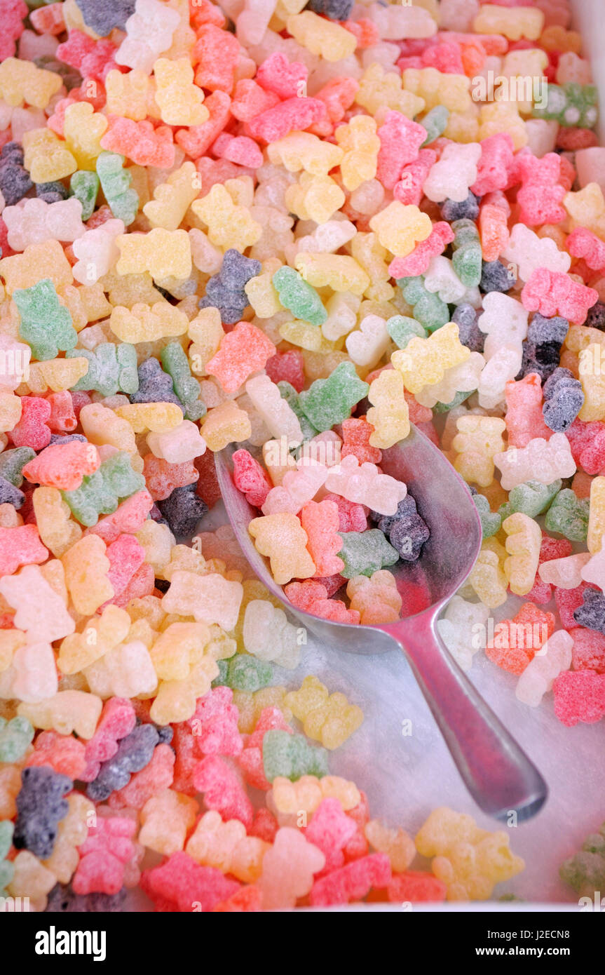 France, Burgundy, Nievre, Clamecy. Candies for sale at a street market ...