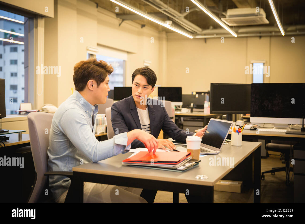 Two serious businessmen Stock Photo - Alamy