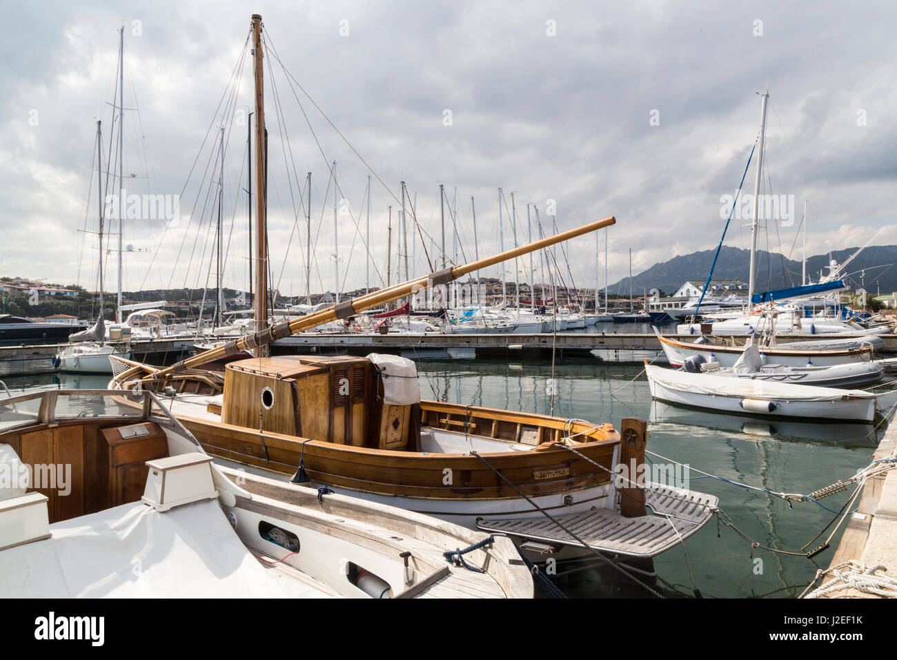 Italy, Sardinia, Costa Smeralda. Boat dock along the Mediterranean ...