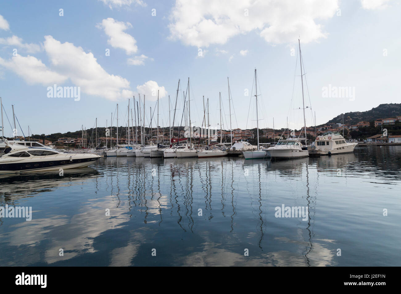 Italy, Sardinia, Costa Smeralda. Boat dock along the Mediterranean ...