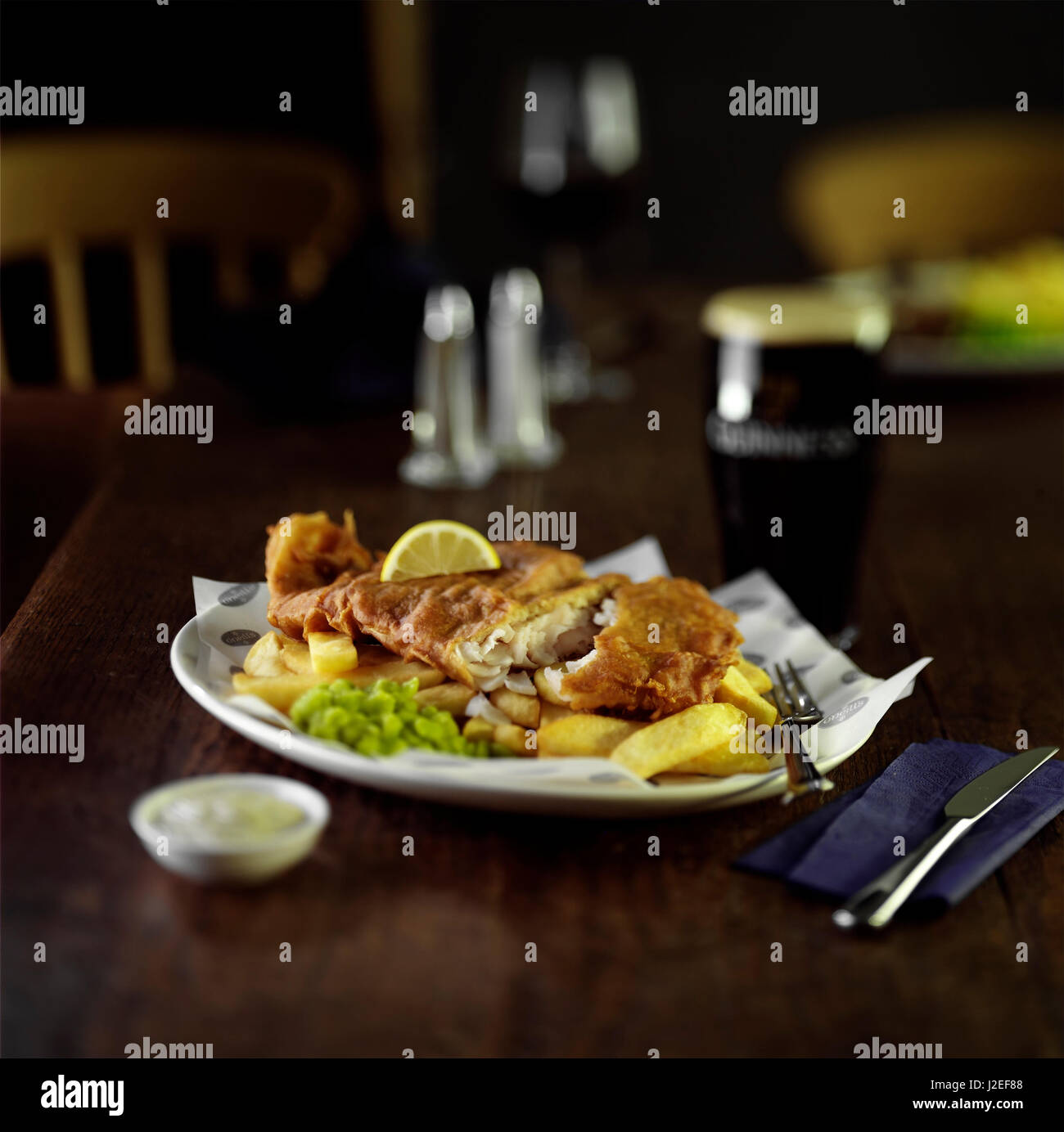 Fish and chips with Guinness Stock Photo - Alamy