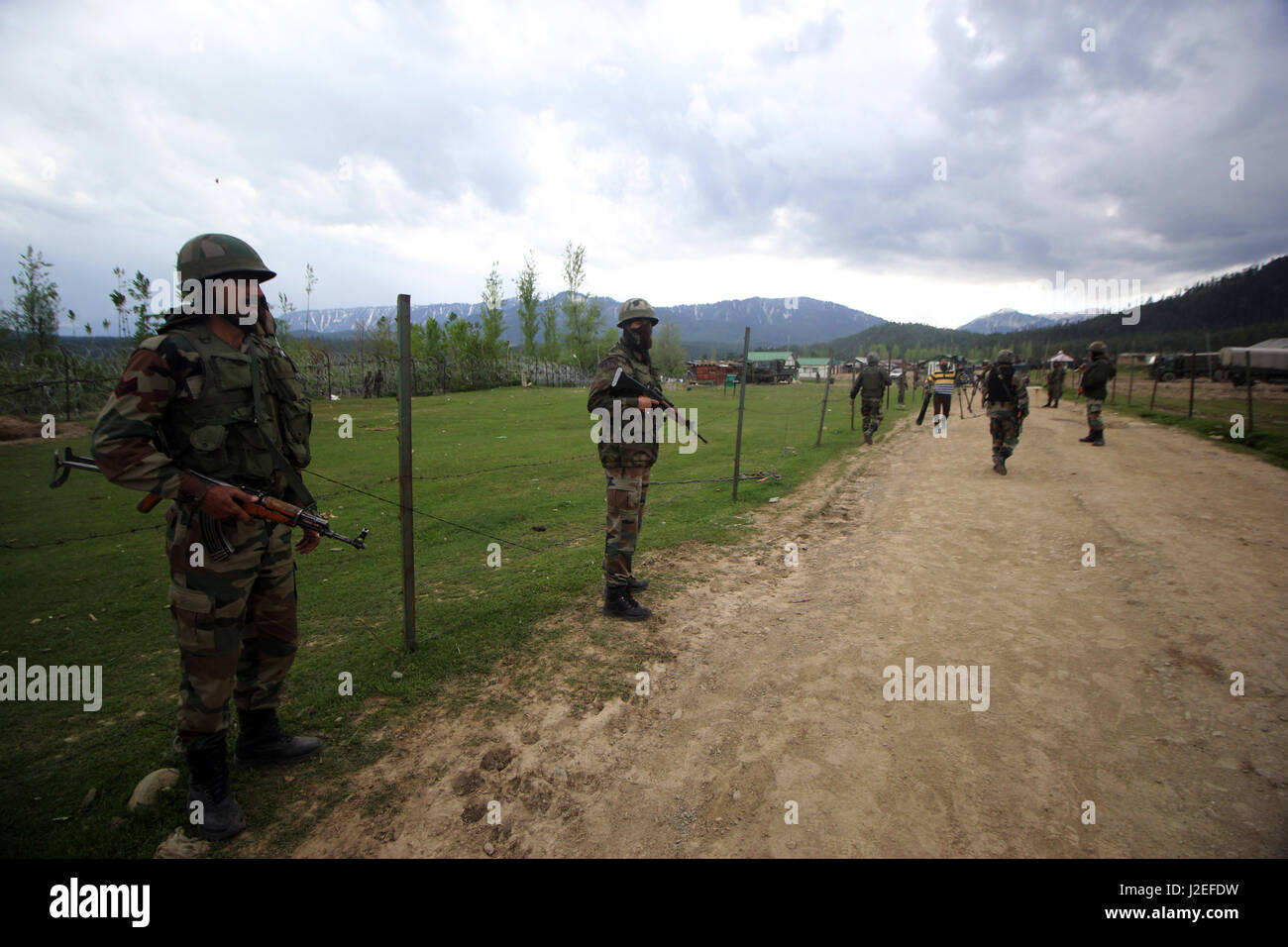 Srinagar, India. 27th Apr, 2017. Indian army personnels stand alerts ...