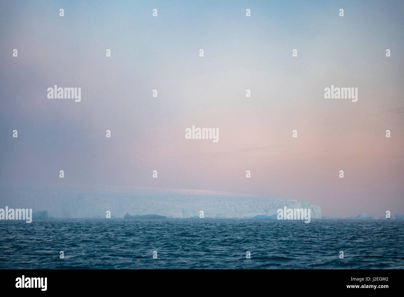 Norway, Svalbard, Kvitoya. Glacier in fog at sunrise. Credit as: Josh ...