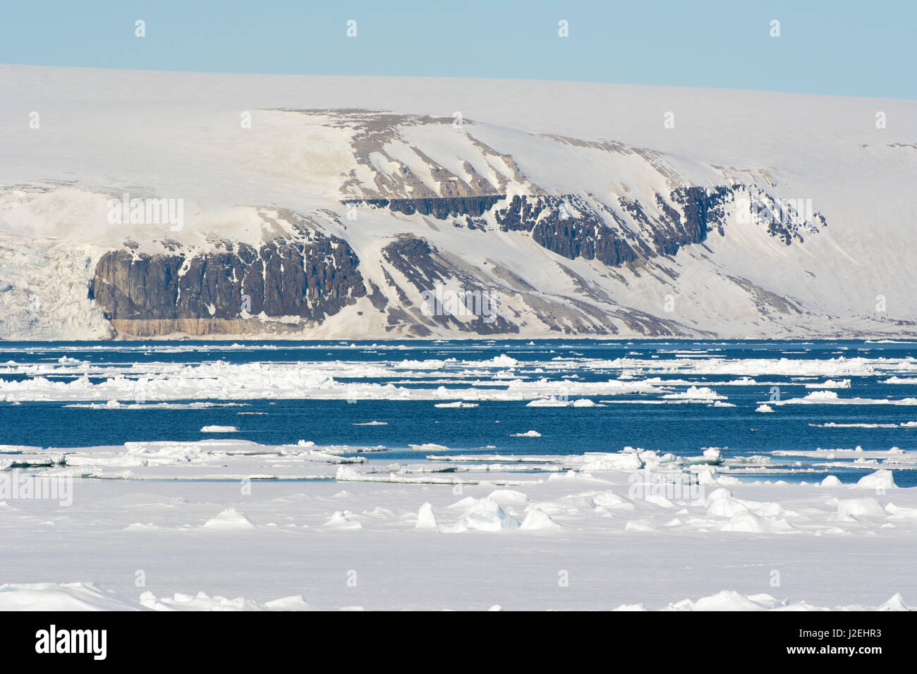 Norway. Svalbard. Hinlopen Strait. Batholithic intrusion Stock Photo ...
