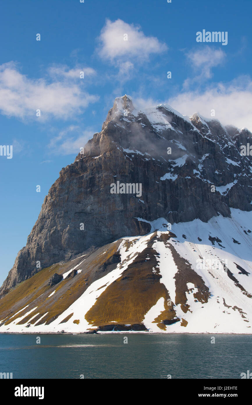 Norway. Svalbard. Hornsund. Dramatic cliffs tower over the sound Stock ...