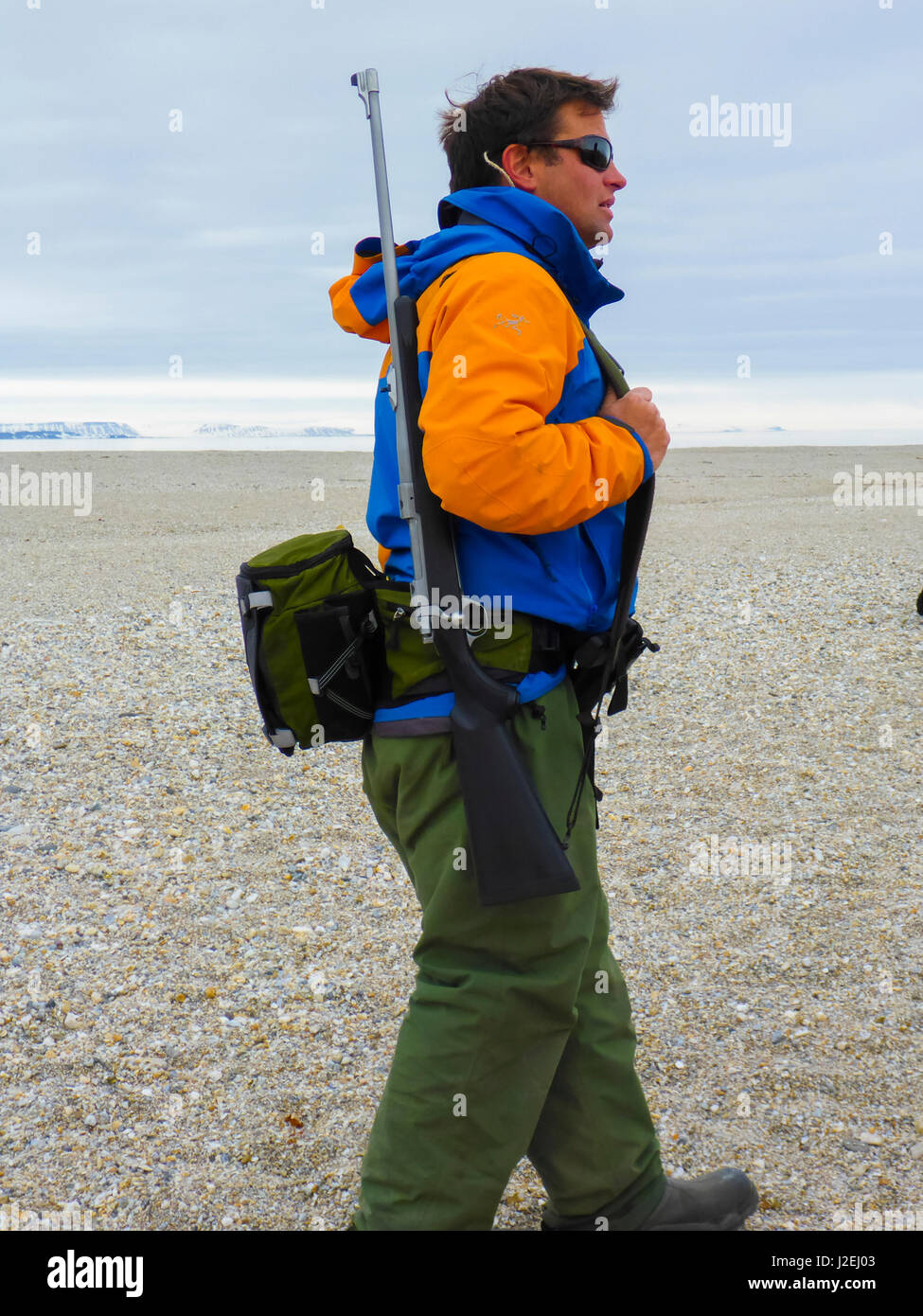 Norway. Svalbard. Nordaustlandet Island. Torellneset. Guides carry ...