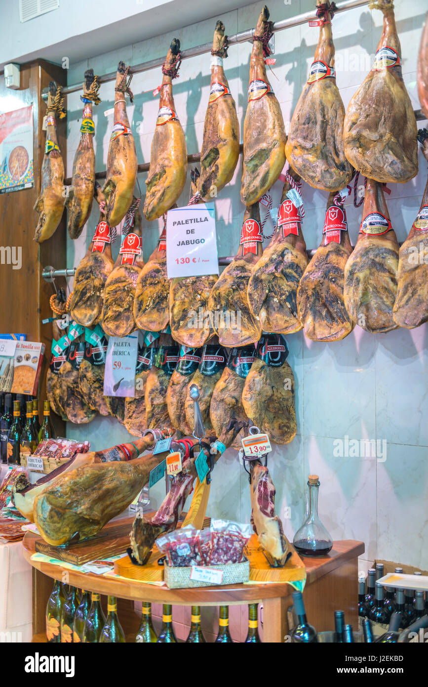 Spain, Barcelona, Iberico ham hanging in store (Large format sizes ...