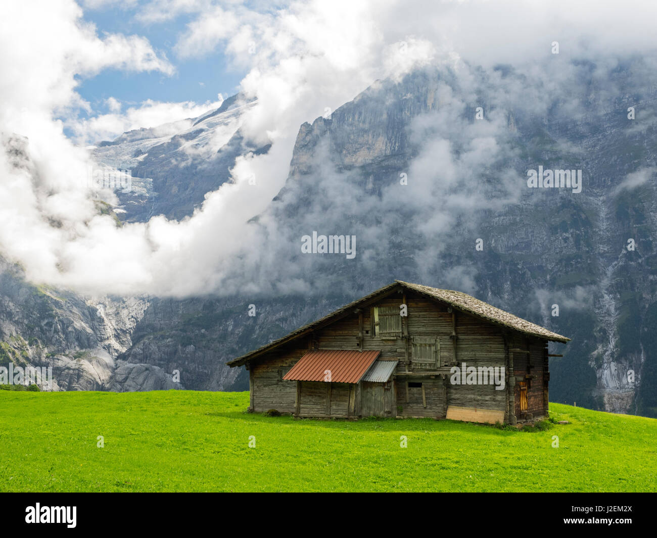 Switzerland, Bern Canton, Grindelwald, Barn in alpine setting Stock ...