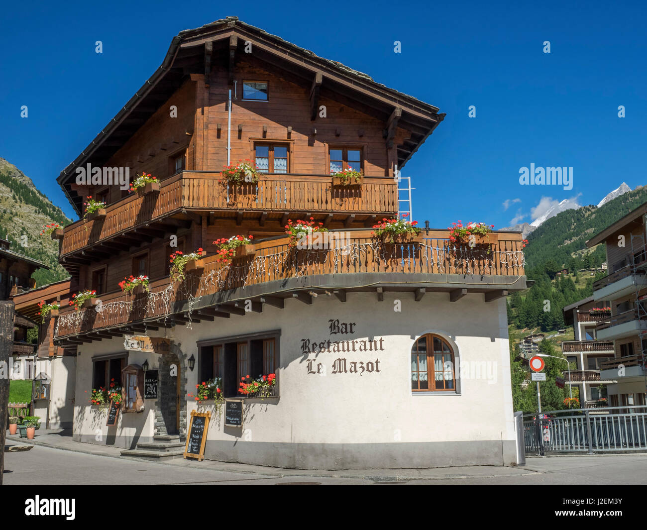 Switzerland, Zermatt, Le Mazot, hotel bar and restaurant Stock Photo ...