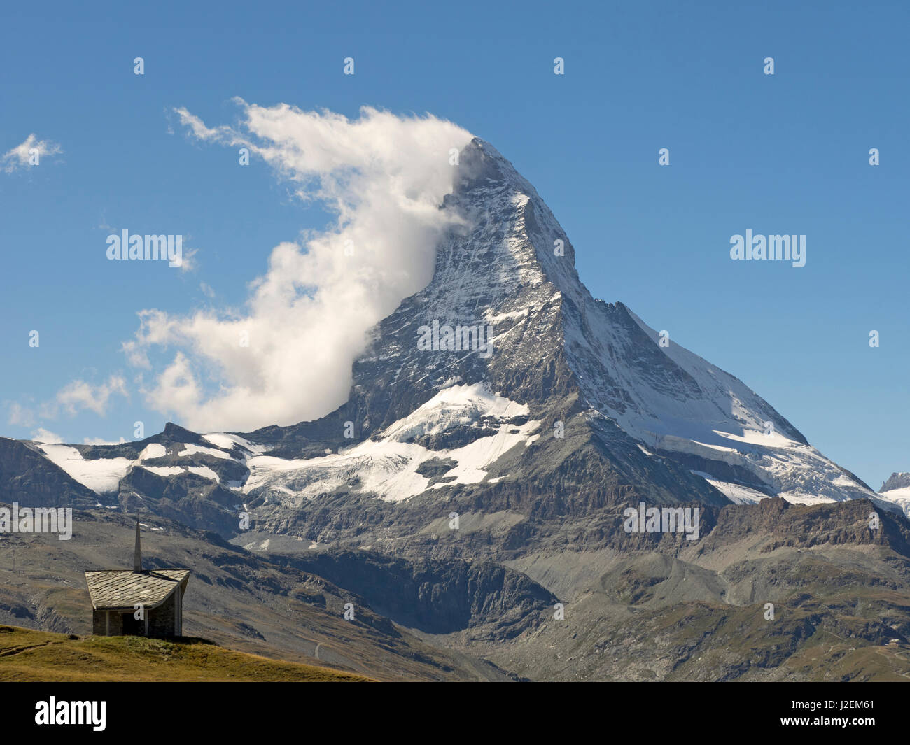 Switzerland, Zermatt, Riffelberg chapel and Matterhorn Stock Photo - Alamy