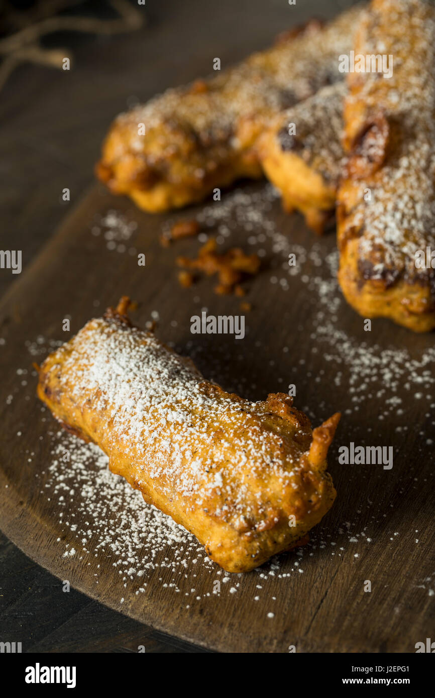 Homemade Deep Fried Candy Bar with Powdered Sugar Stock Photo - Alamy