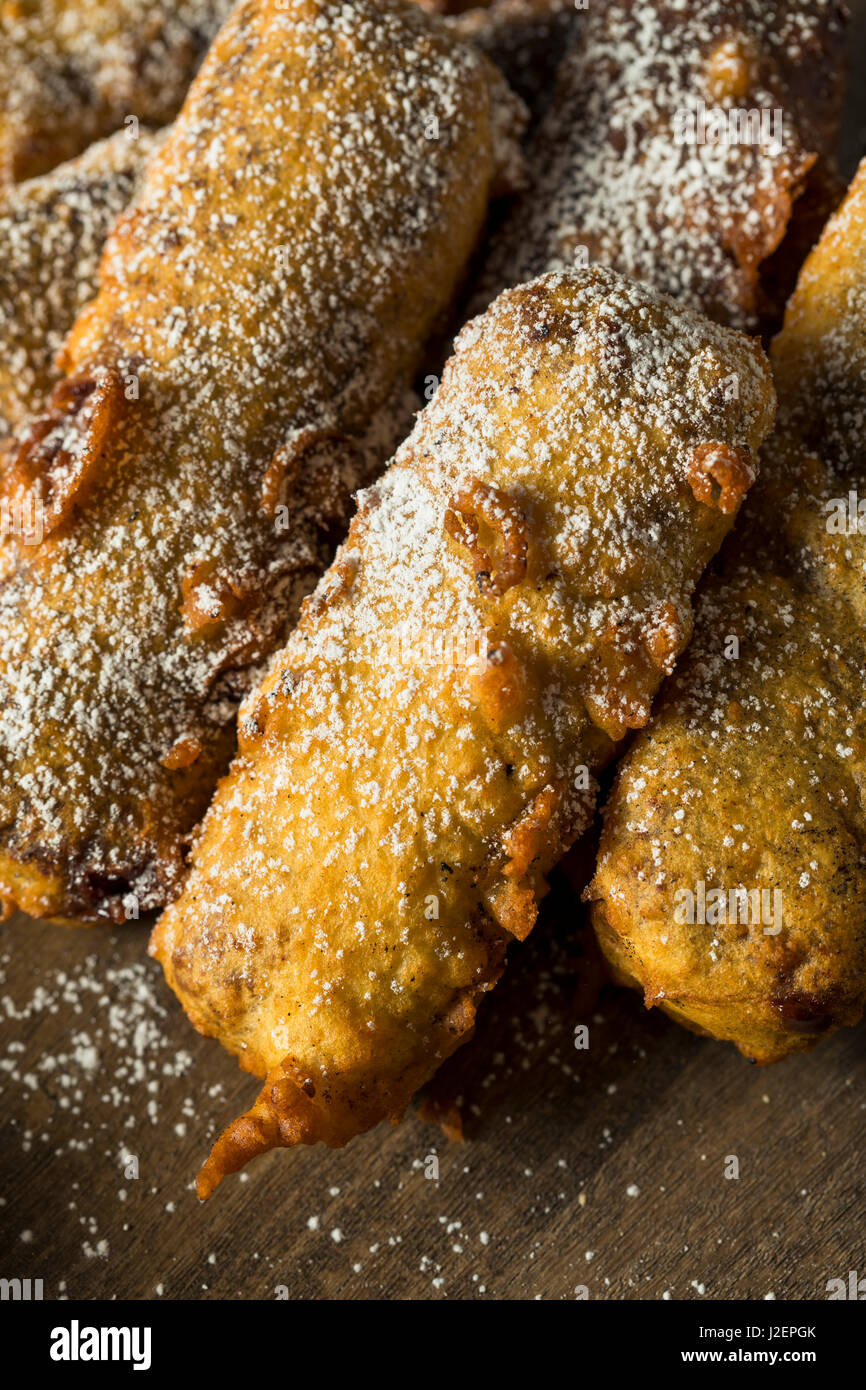Homemade Deep Fried Candy Bar with Powdered Sugar Stock Photo - Alamy