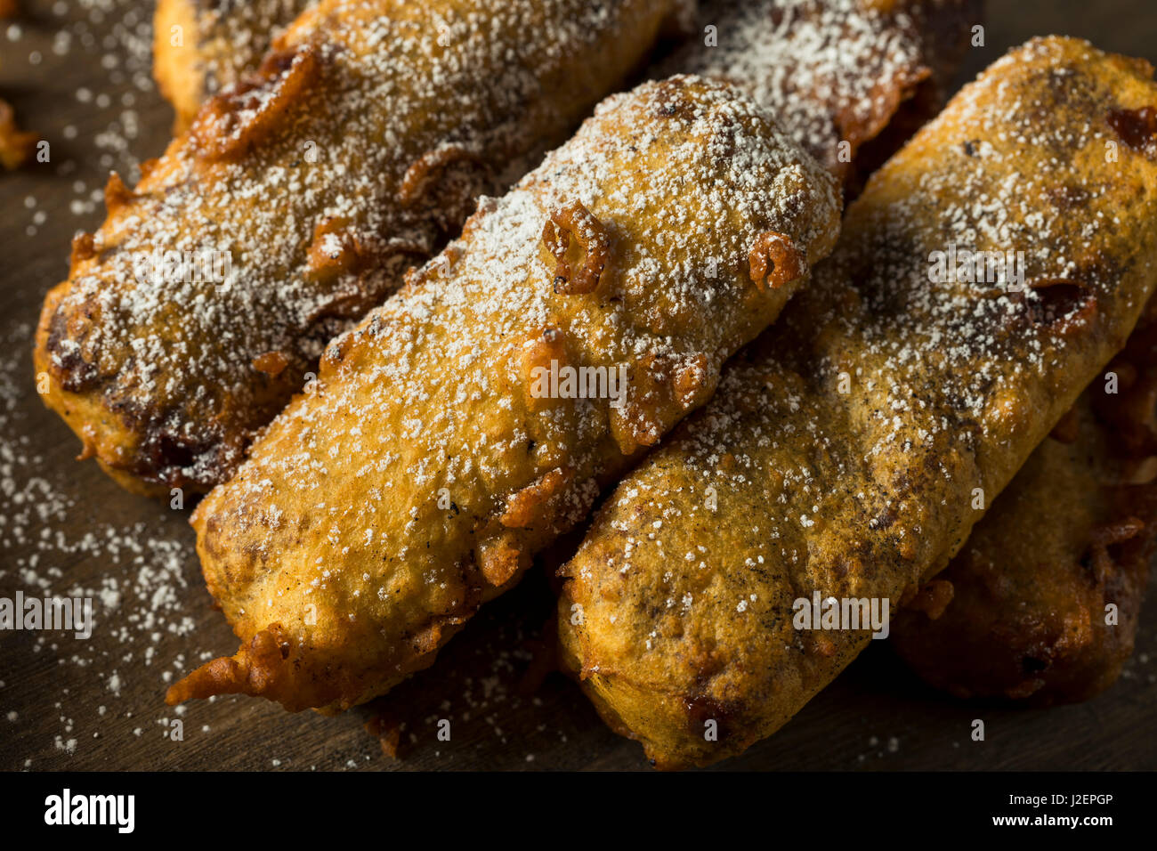 Homemade Deep Fried Candy Bar with Powdered Sugar Stock Photo - Alamy