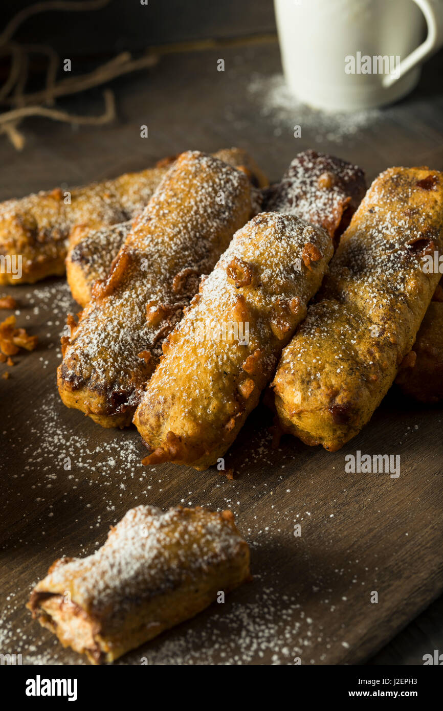 Homemade Deep Fried Candy Bar with Powdered Sugar Stock Photo - Alamy