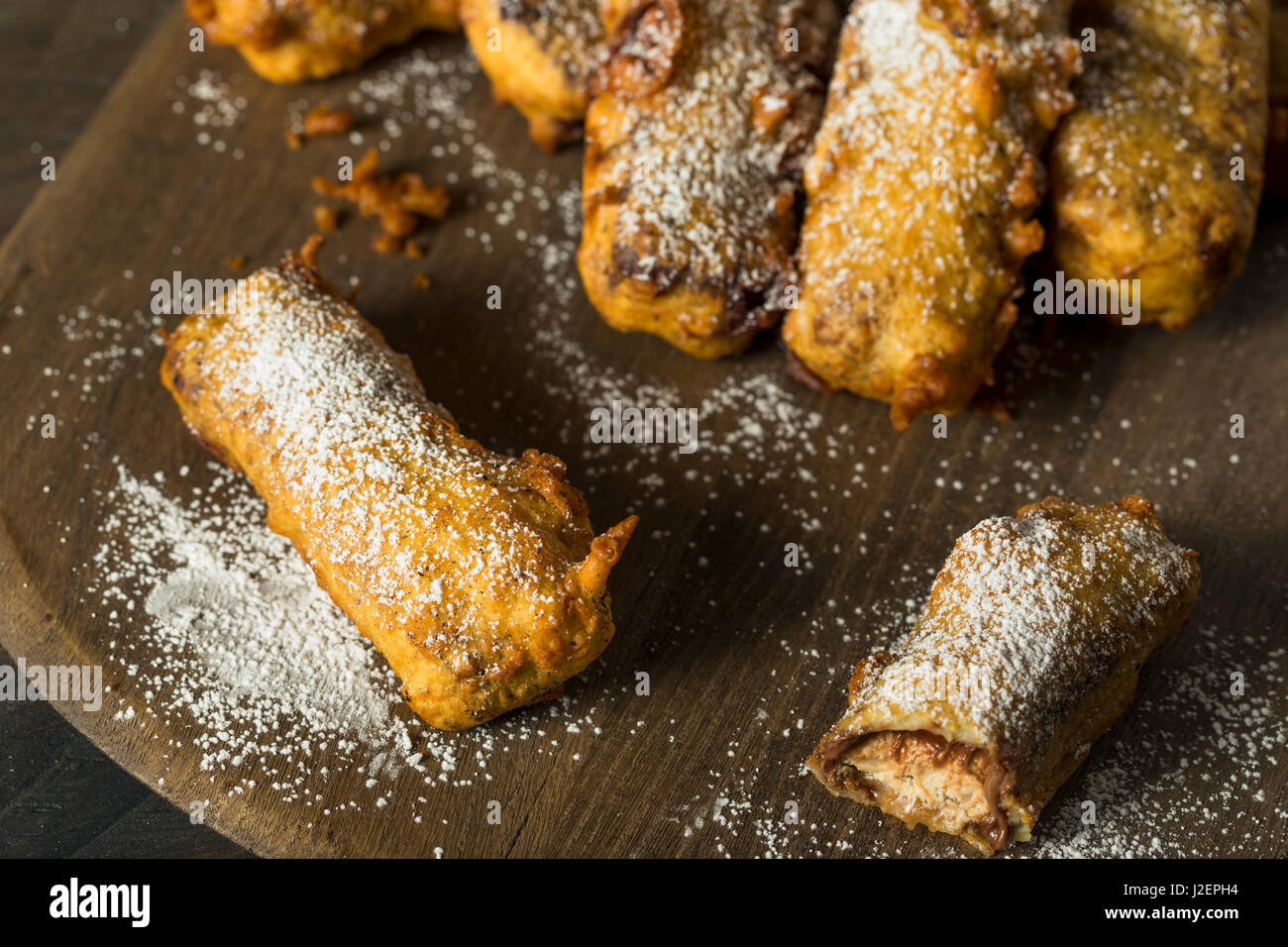 Homemade Deep Fried Candy Bar with Powdered Sugar Stock Photo - Alamy