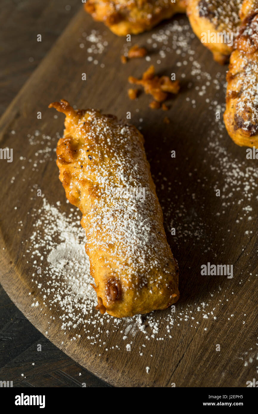 Homemade Deep Fried Candy Bar with Powdered Sugar Stock Photo - Alamy