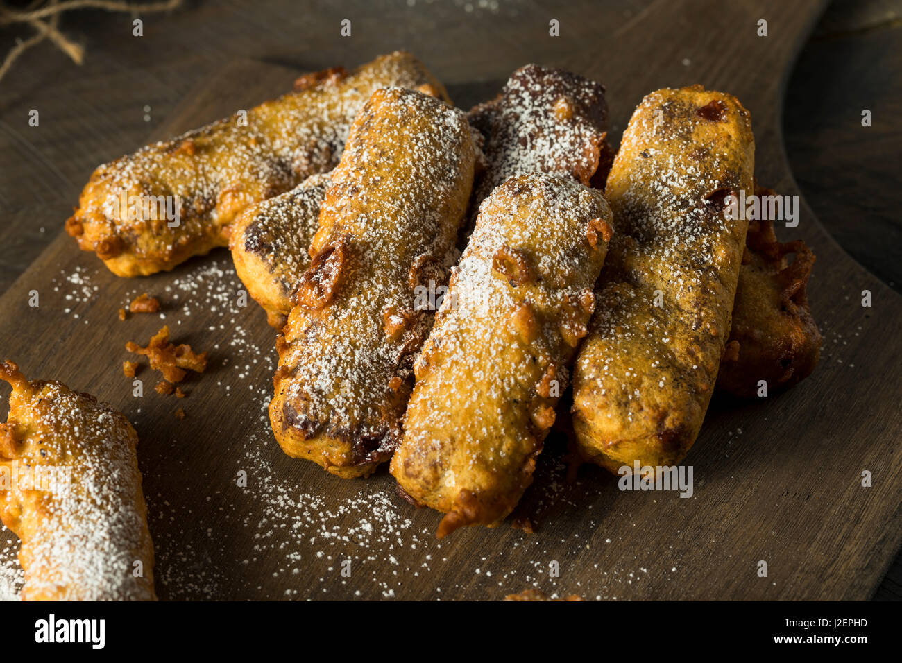 Homemade Deep Fried Candy Bar with Powdered Sugar Stock Photo - Alamy