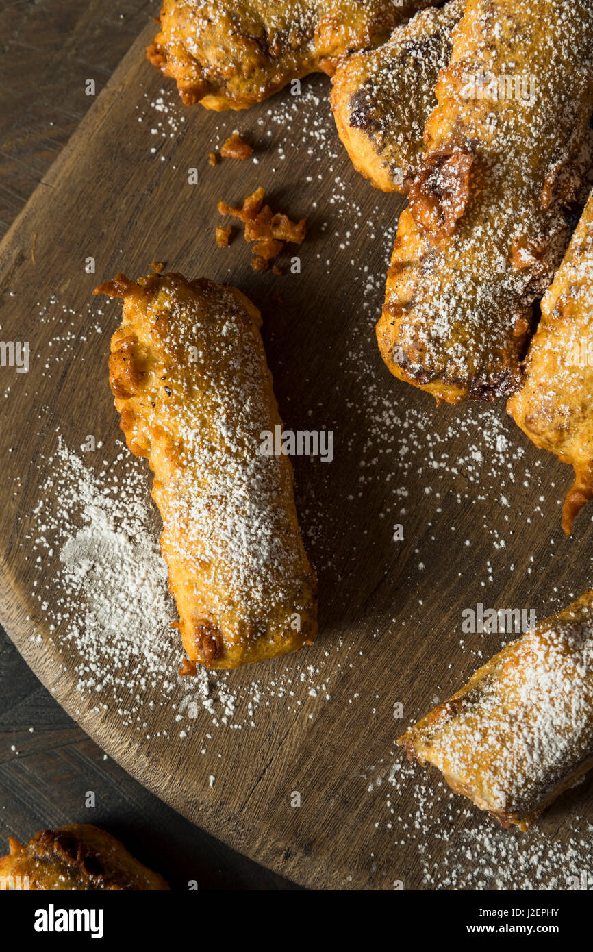 Homemade Deep Fried Candy Bar with Powdered Sugar Stock Photo - Alamy