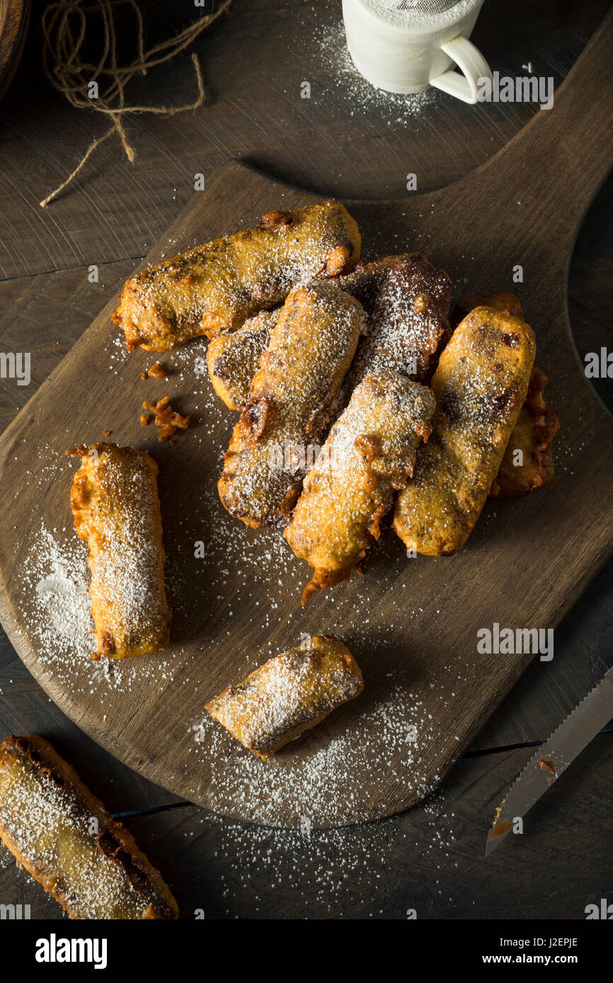 Homemade Deep Fried Candy Bar with Powdered Sugar Stock Photo - Alamy