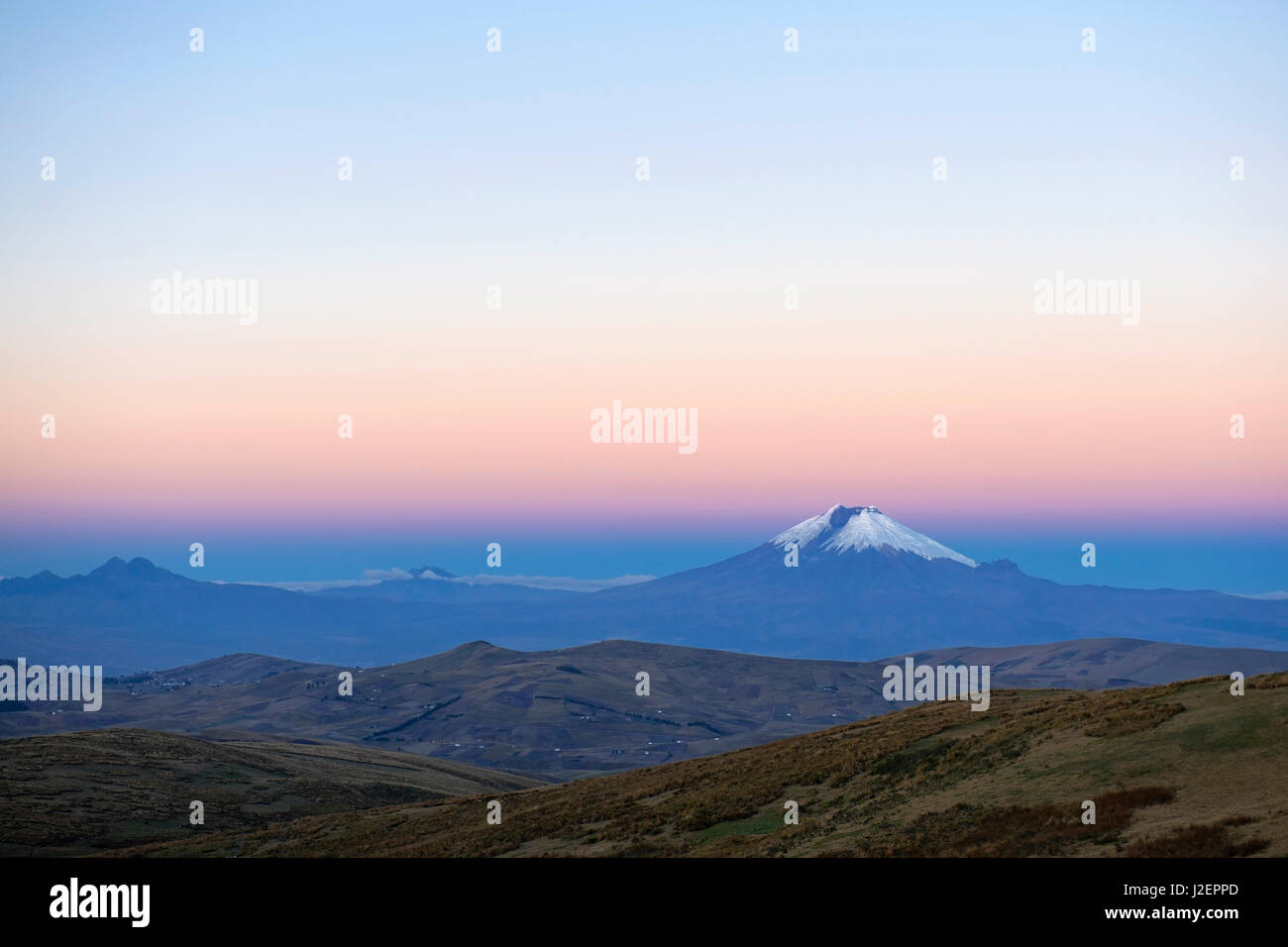 Landscape of the active 5897 meters high Cotopaxi volcano at sunset ...