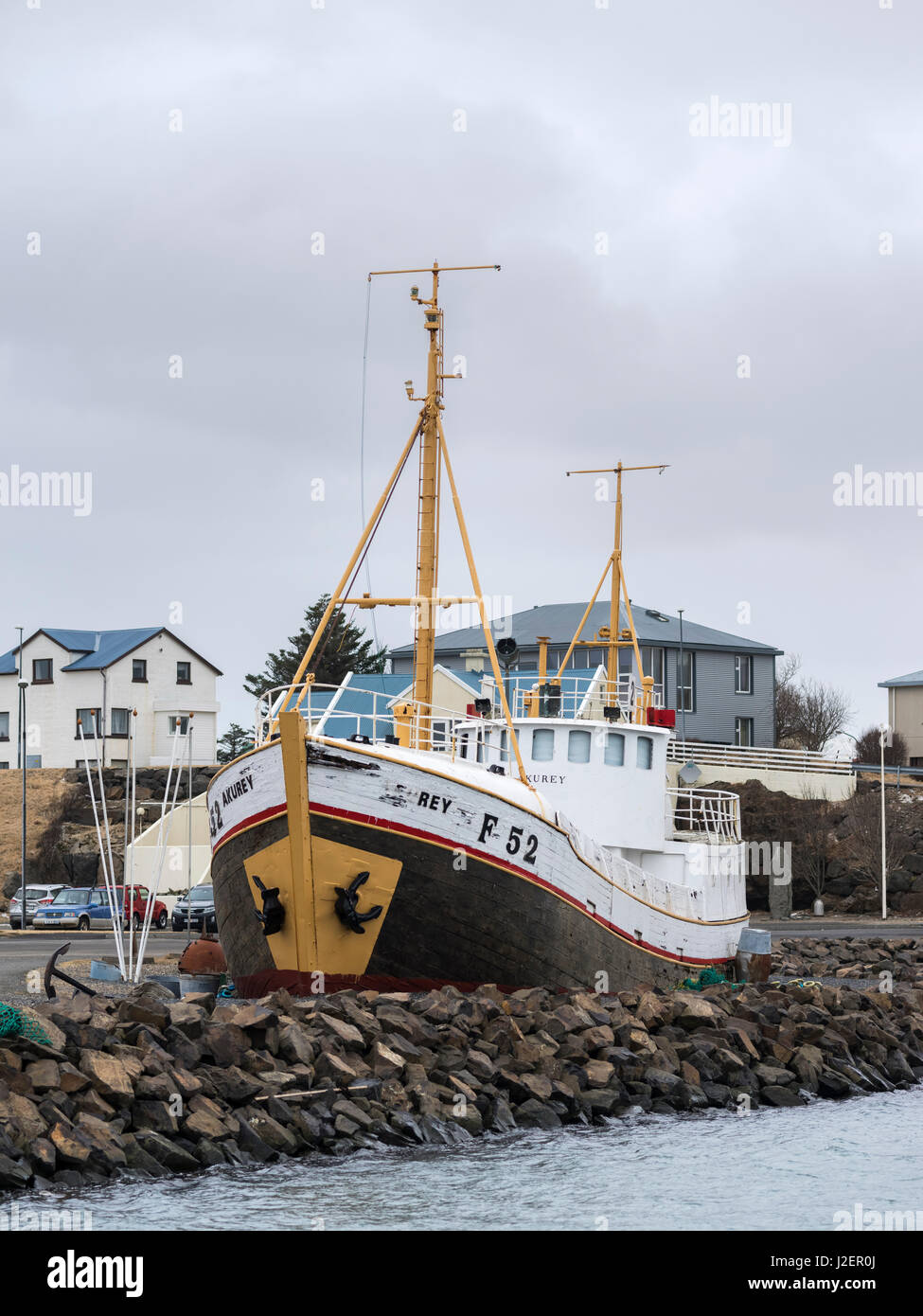 Town of Hofn during winter. Old ship used as a museum in the harbor ...