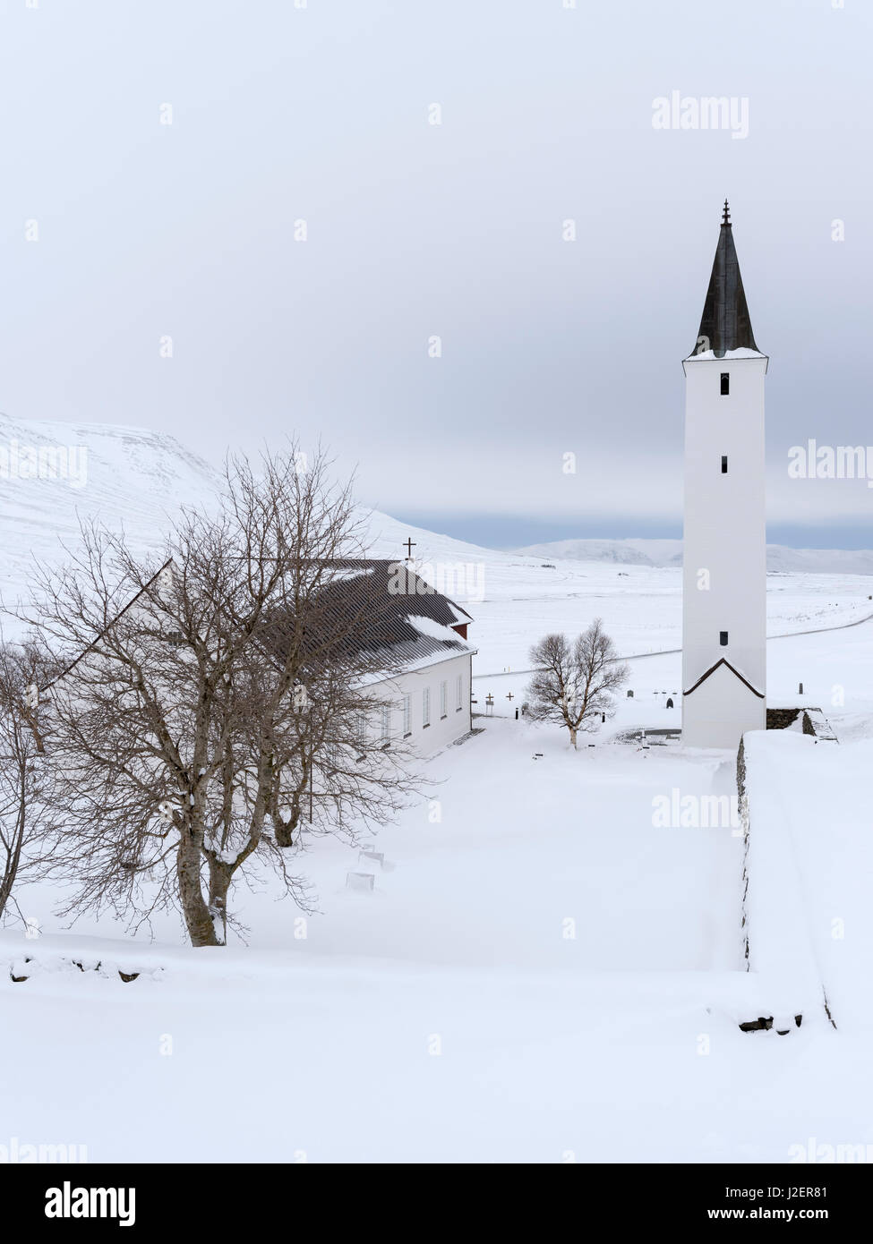 Church in Holar during winter. Holar is a famous archaeological site and is home to the Holar ...
