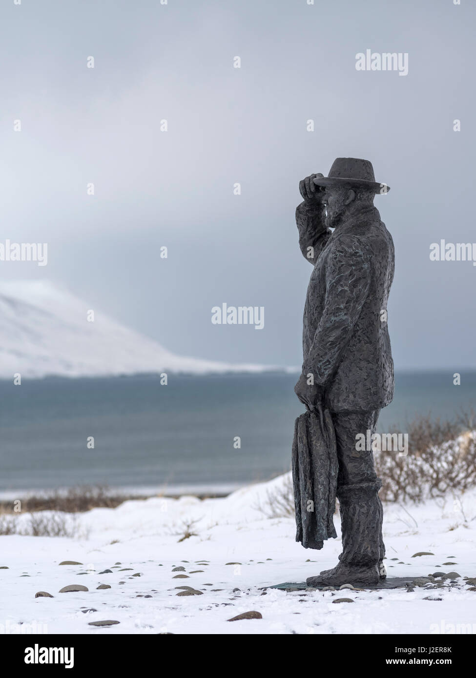 Statue of Jon Osmann (The ferryman) in Skagafjordur looking across the ...