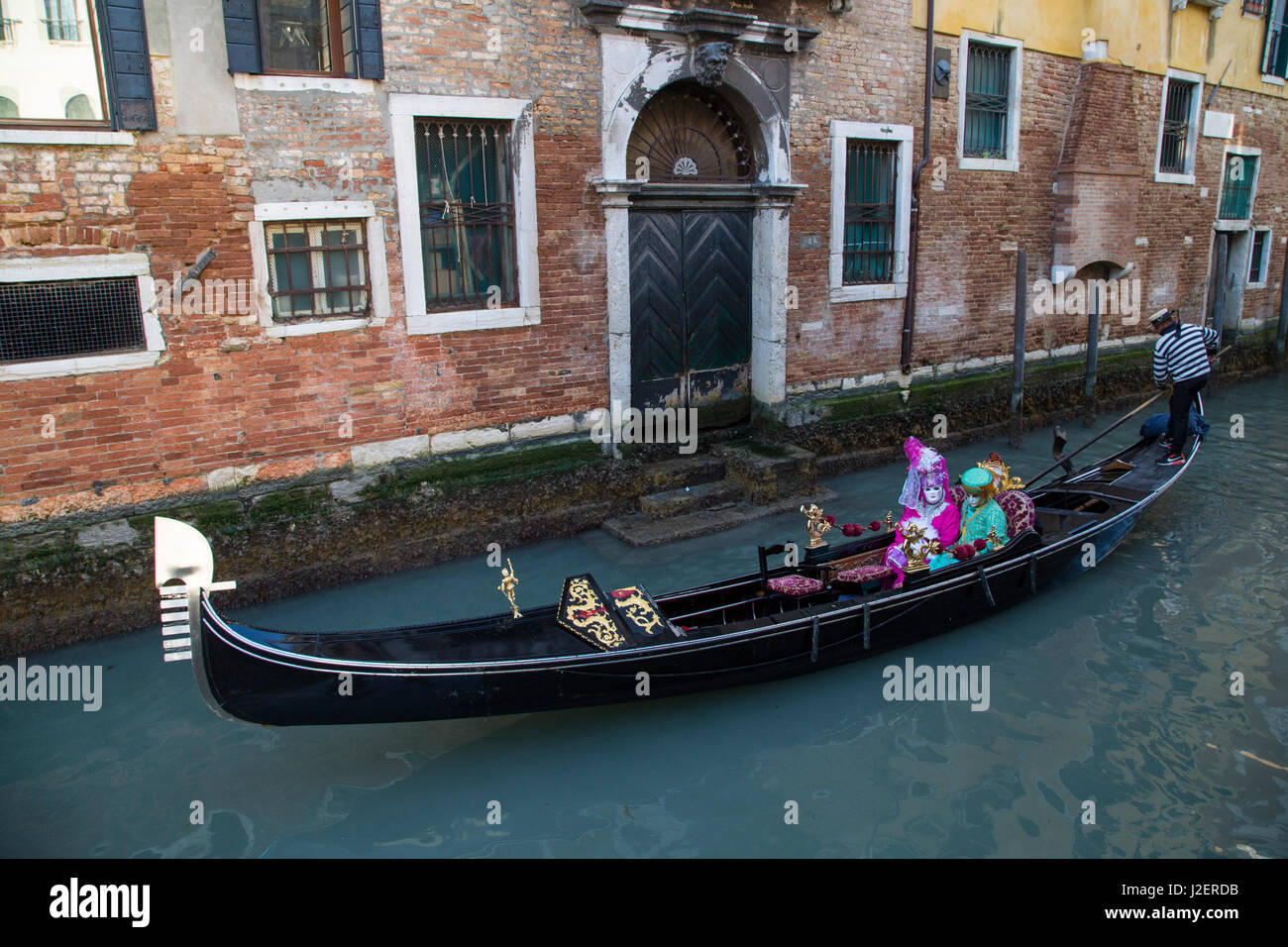 Couple dressed for Gondola ride Venice at Carnival Time, Italy Stock ...