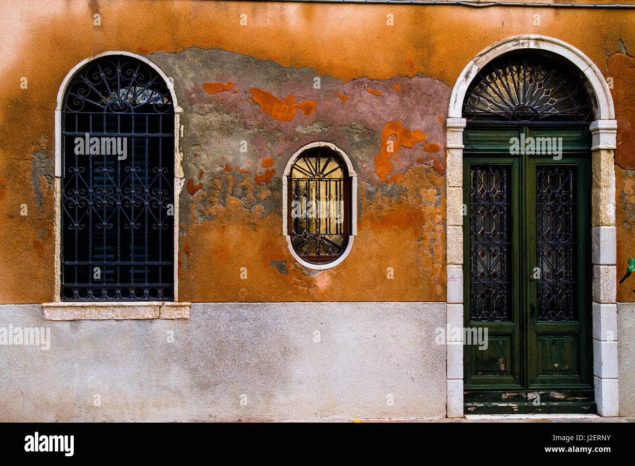 Italy ornate rod iron arched windows a hi-res stock photography and ...