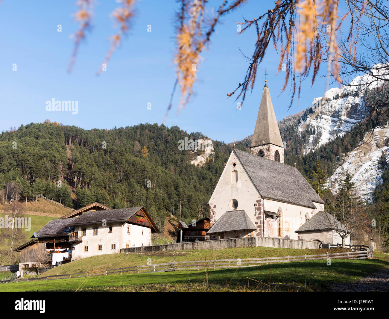 The church Sankt Magdalena in valley Villnoess in the dolomites ...