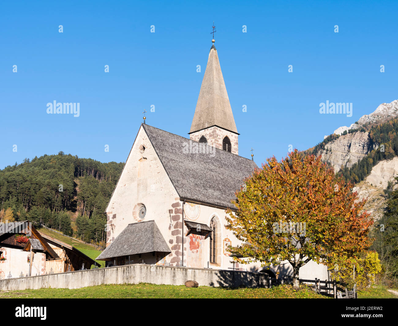 The church Sankt Magdalena in valley Villnoess in the dolomites ...
