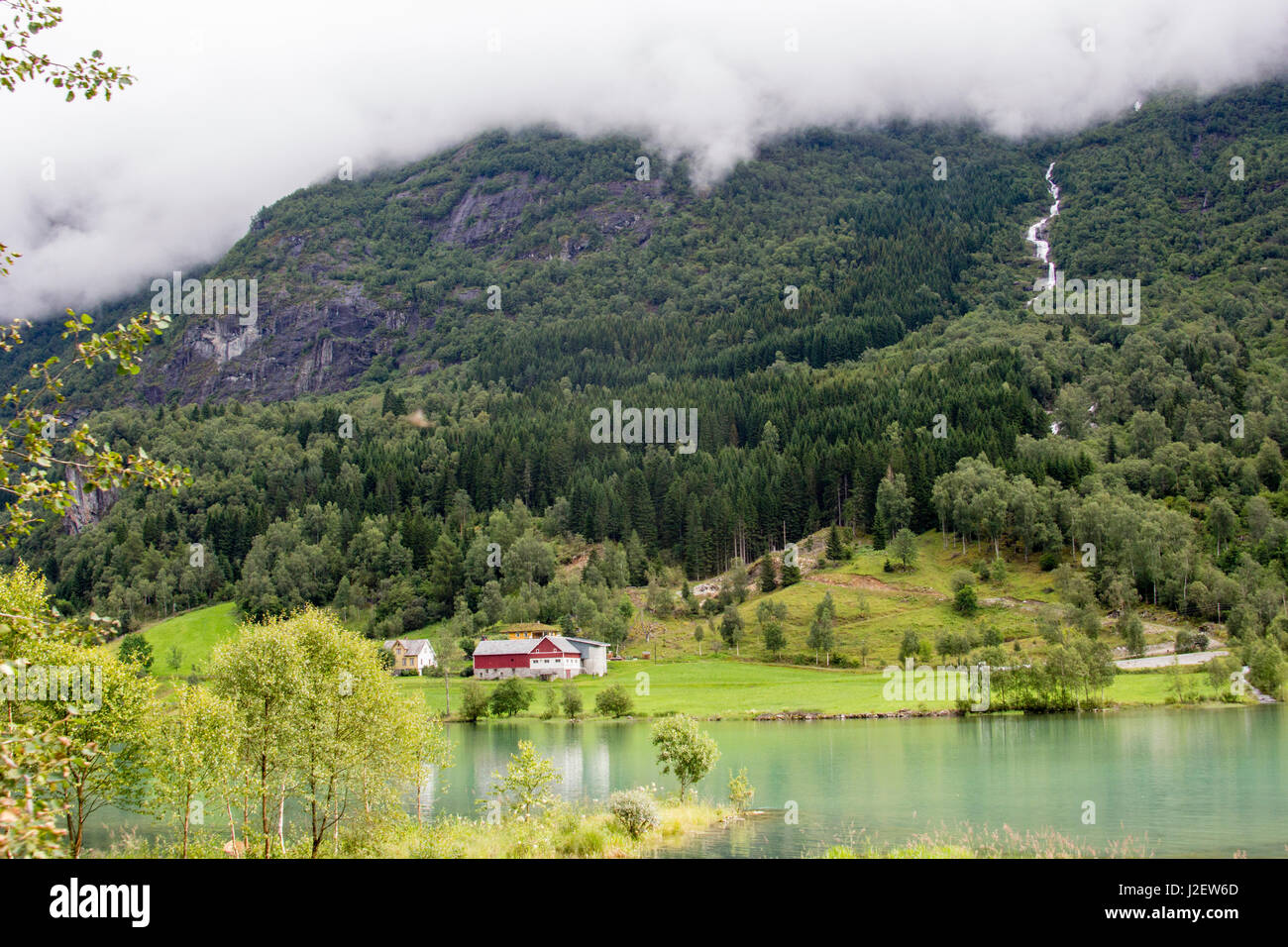 Waterfall. Buildings. Architecture. Olden. Norway Stock Photo - Alamy