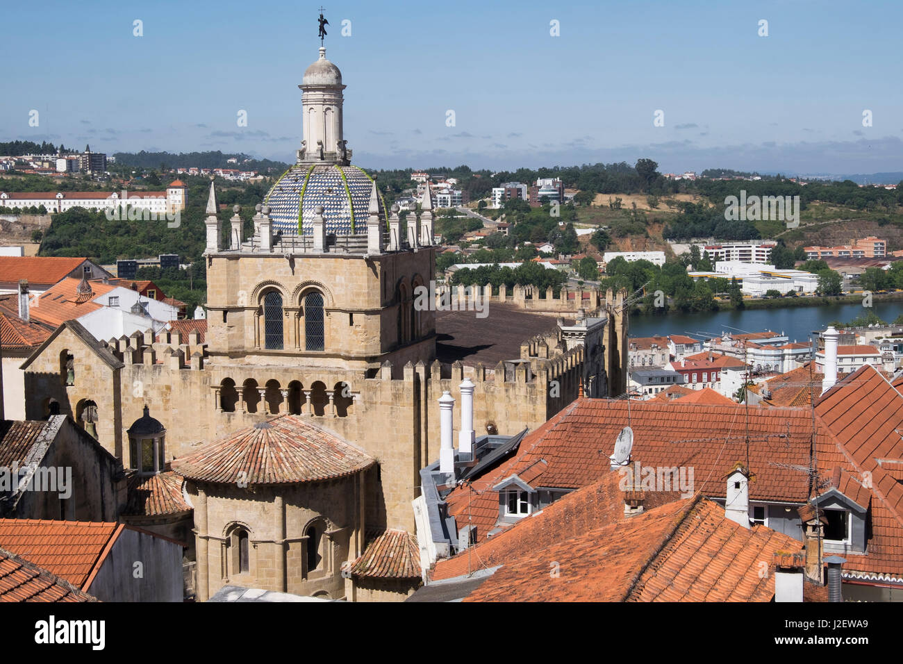 Portugal, Coimbra. Romanesque style tower and dome of the Coimbra ...
