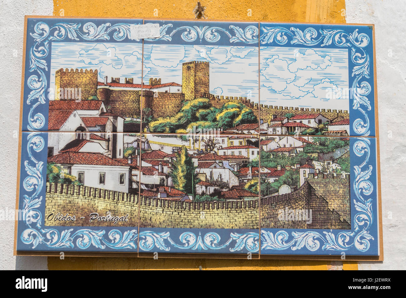 Portugal, Obidos, colorful hand painted tile of Obidos Stock Photo - Alamy