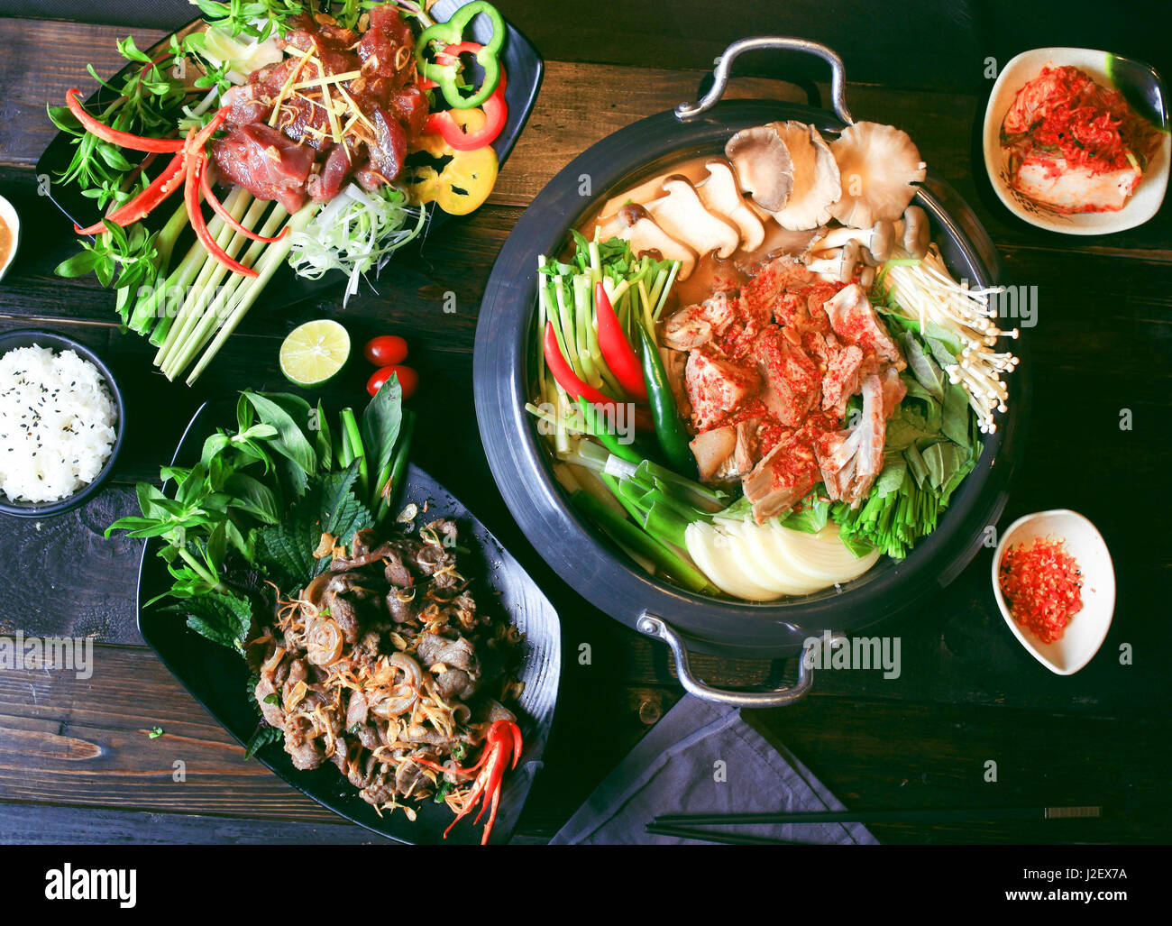 Prepared hot pot of beef with chili, mushroom, herbs, lemongrass and ...