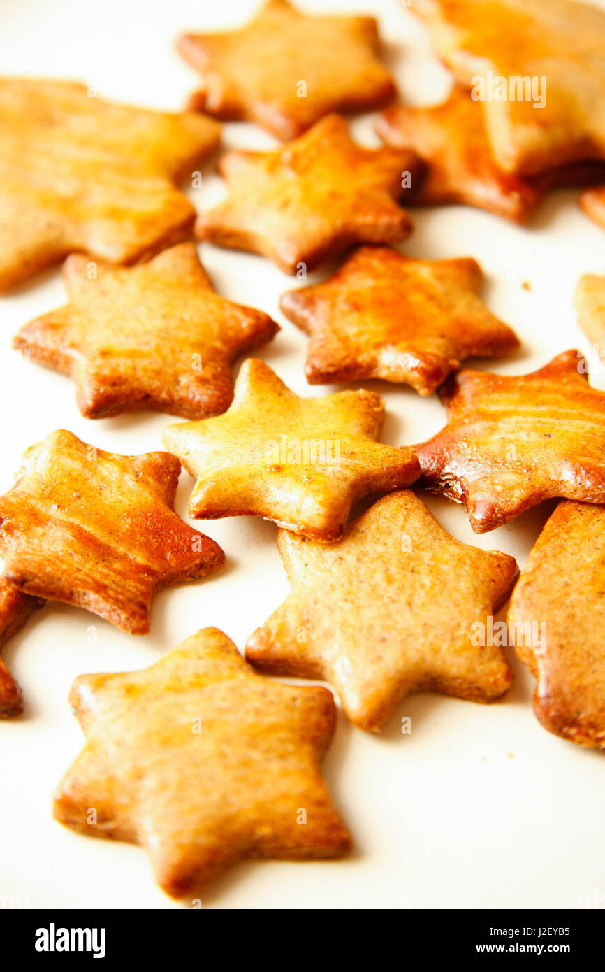 Cakes and biscuits with star shape on white background Stock Photo - Alamy