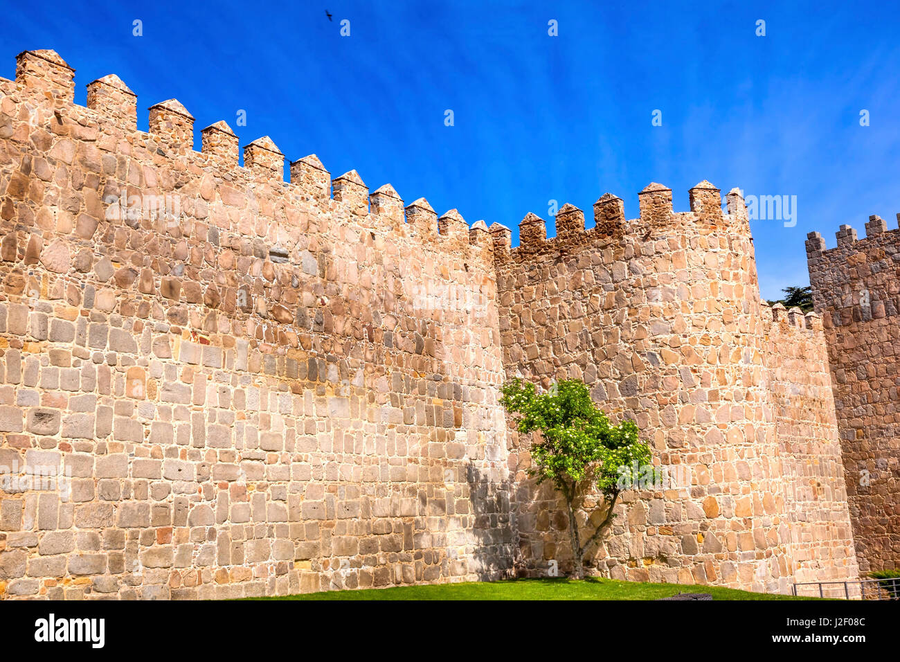 Avila, castle walls and turret, Castile, Spain. Avila described as the ...